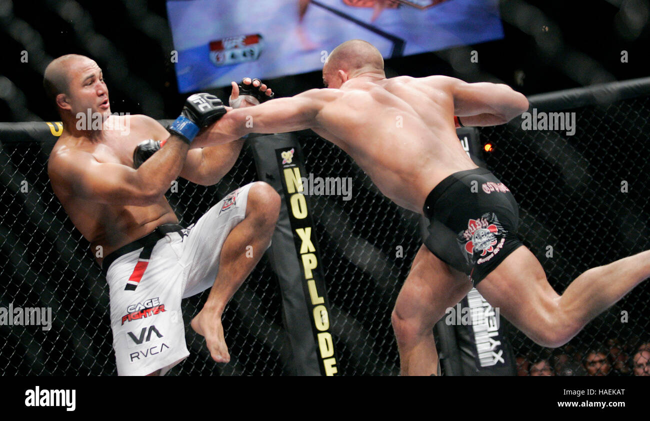 Georges St.-Pierre, right, fights BJ Penn at the UFC 94 at the MGM ...