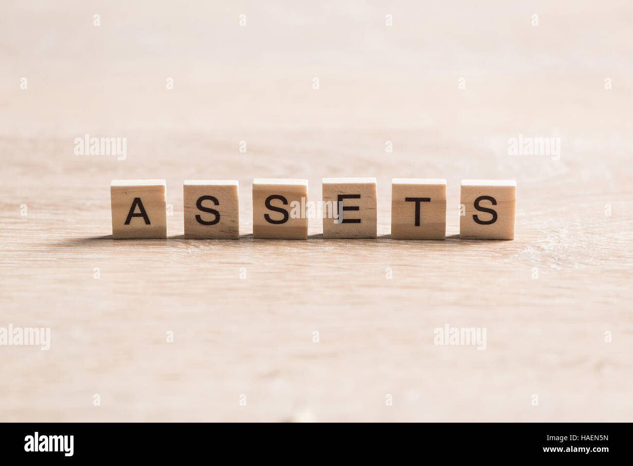 word assets of wooden elements with letters Stock Photo - Alamy