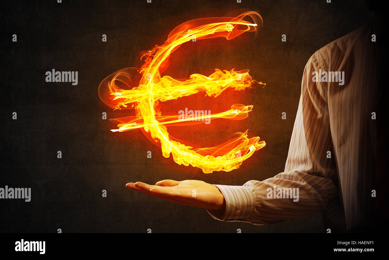 Euro currency fire symbol Stock Photo - Alamy