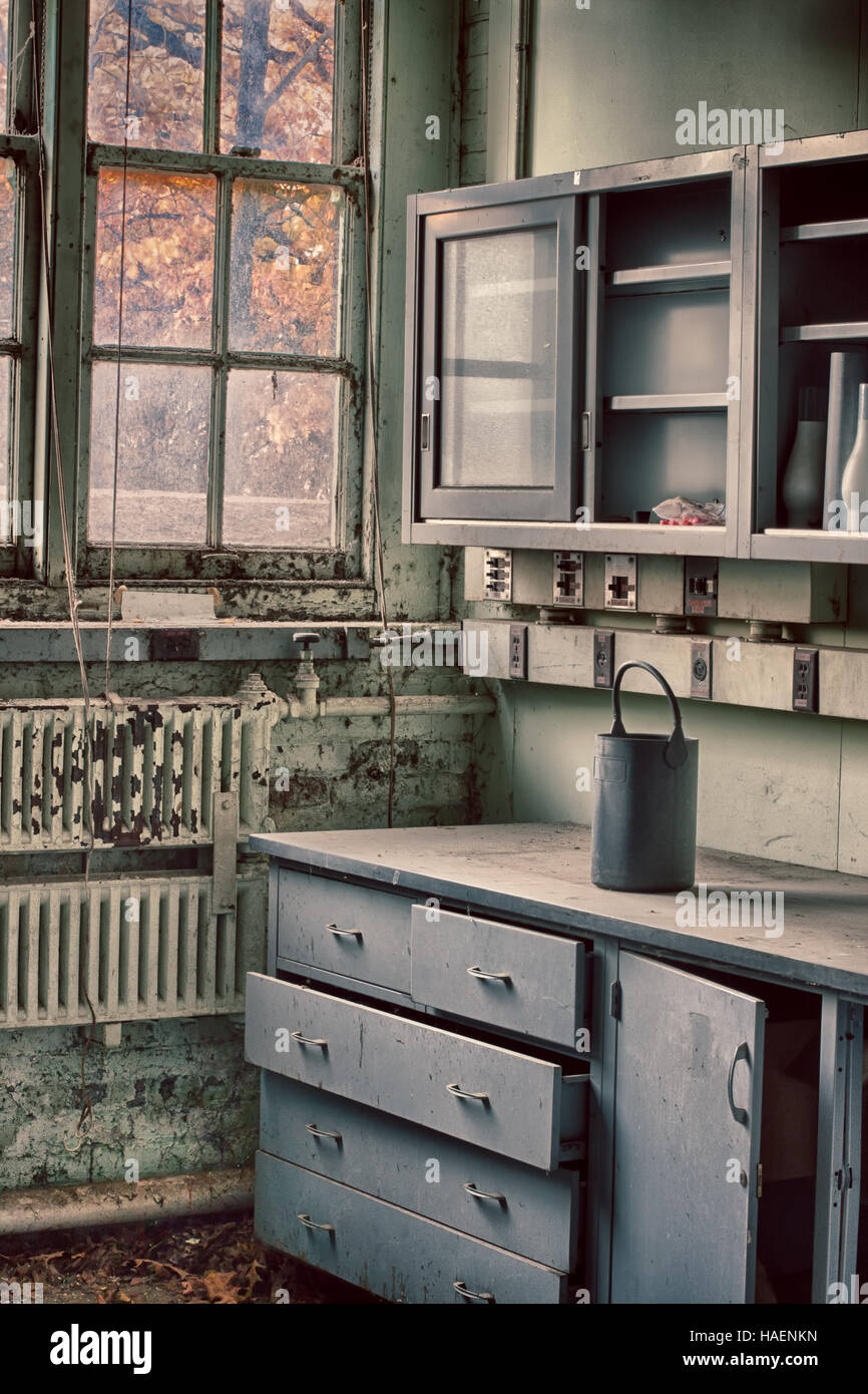 Abandoned dusty science laboratory in old building, on a cloudy autumn ...