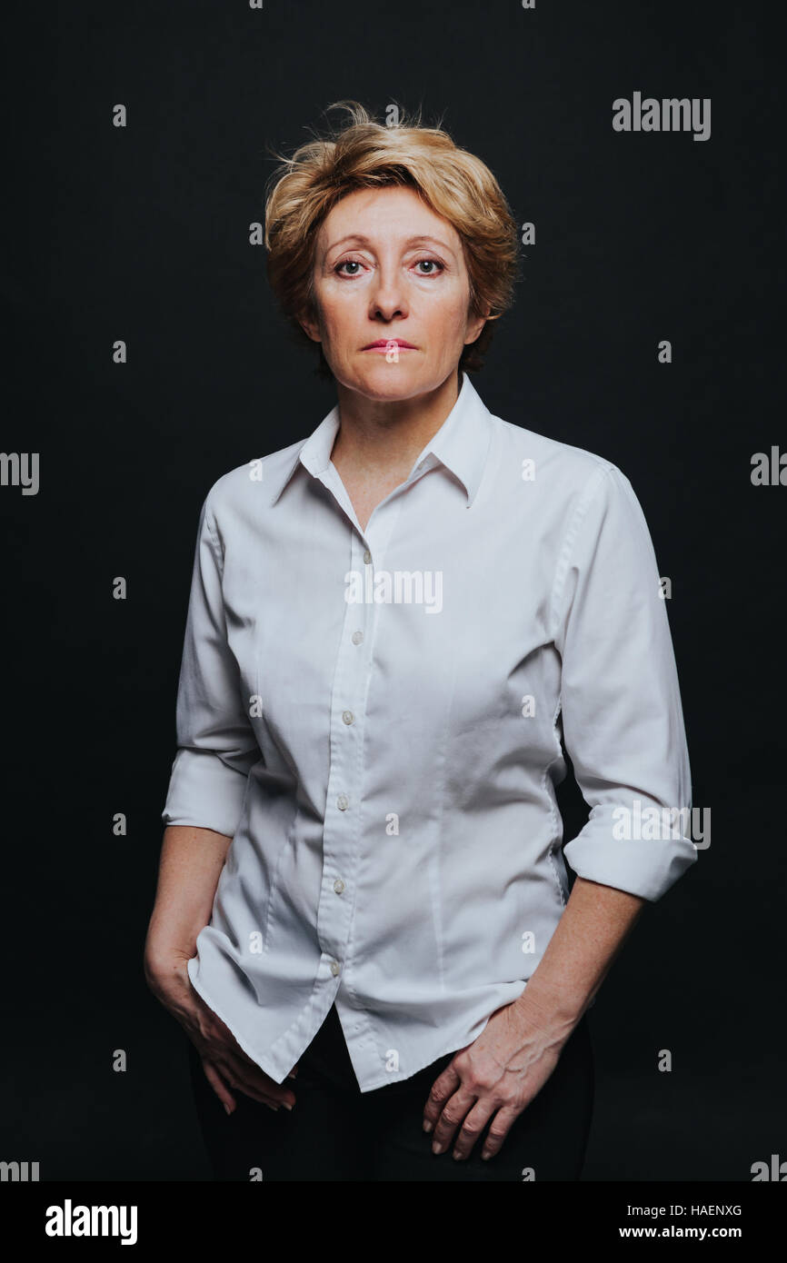 Serious successful middle aged woman hi-res stock photography and ...