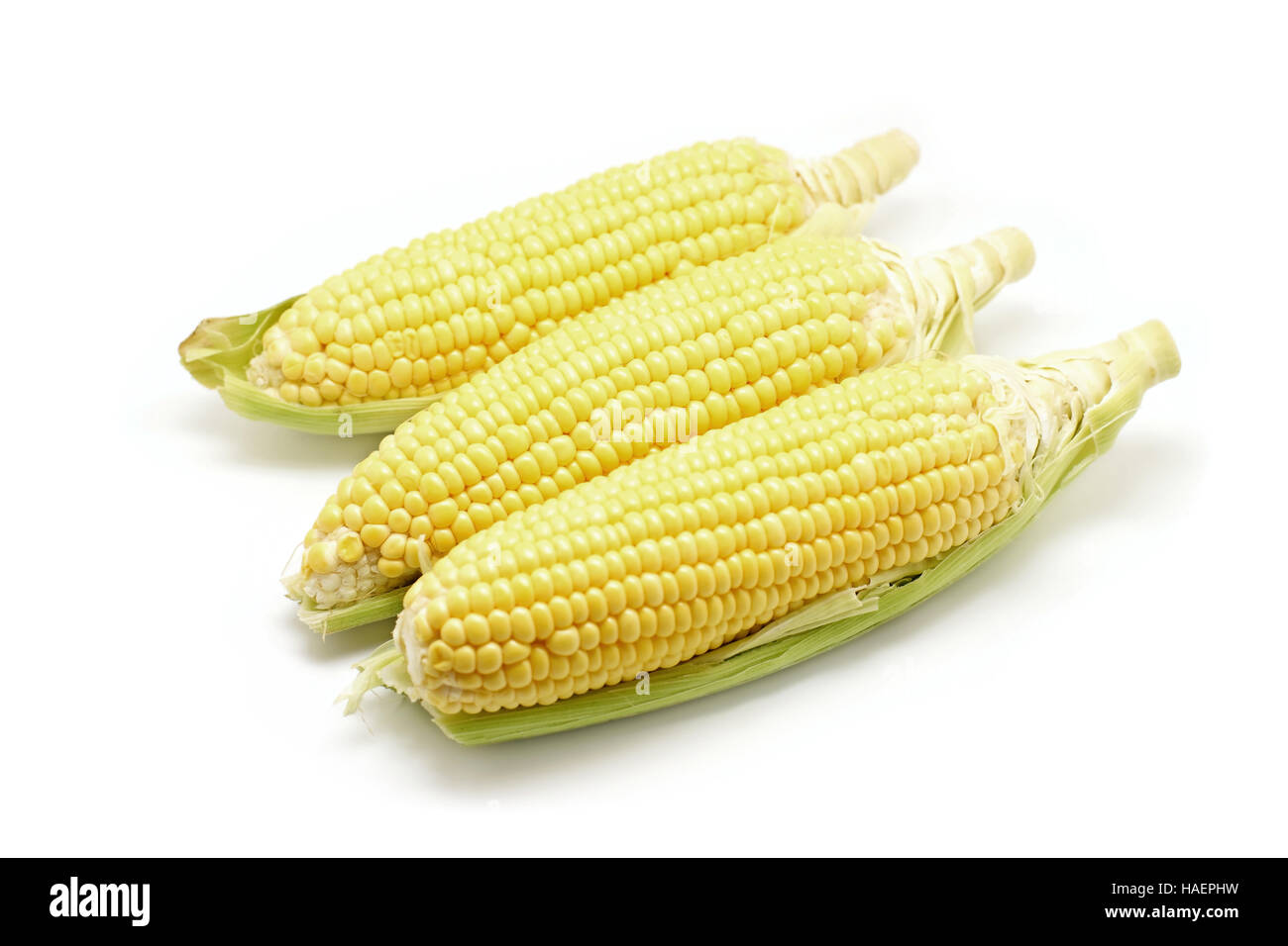 closeup of sweet corns isolated on white background Stock Photo - Alamy