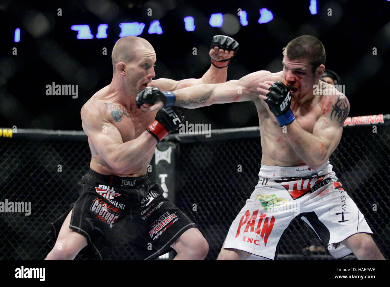 Gray Maynard, left, fights Jim Miller during UFC 96 at the Nationwide ...