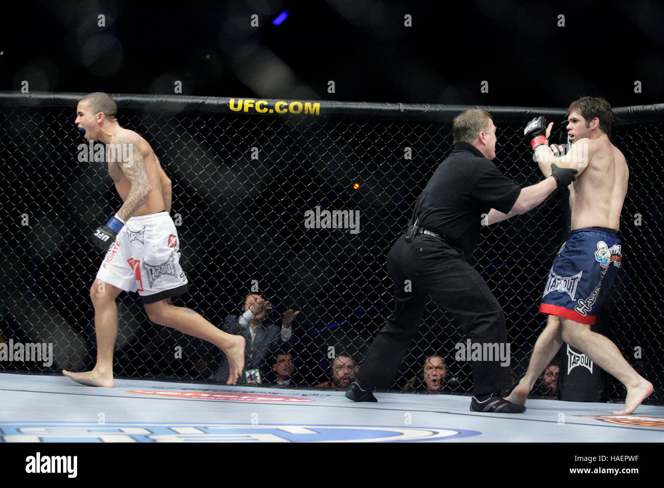 Aaron Riley, right, is stopped by referee during fight against Shane ...