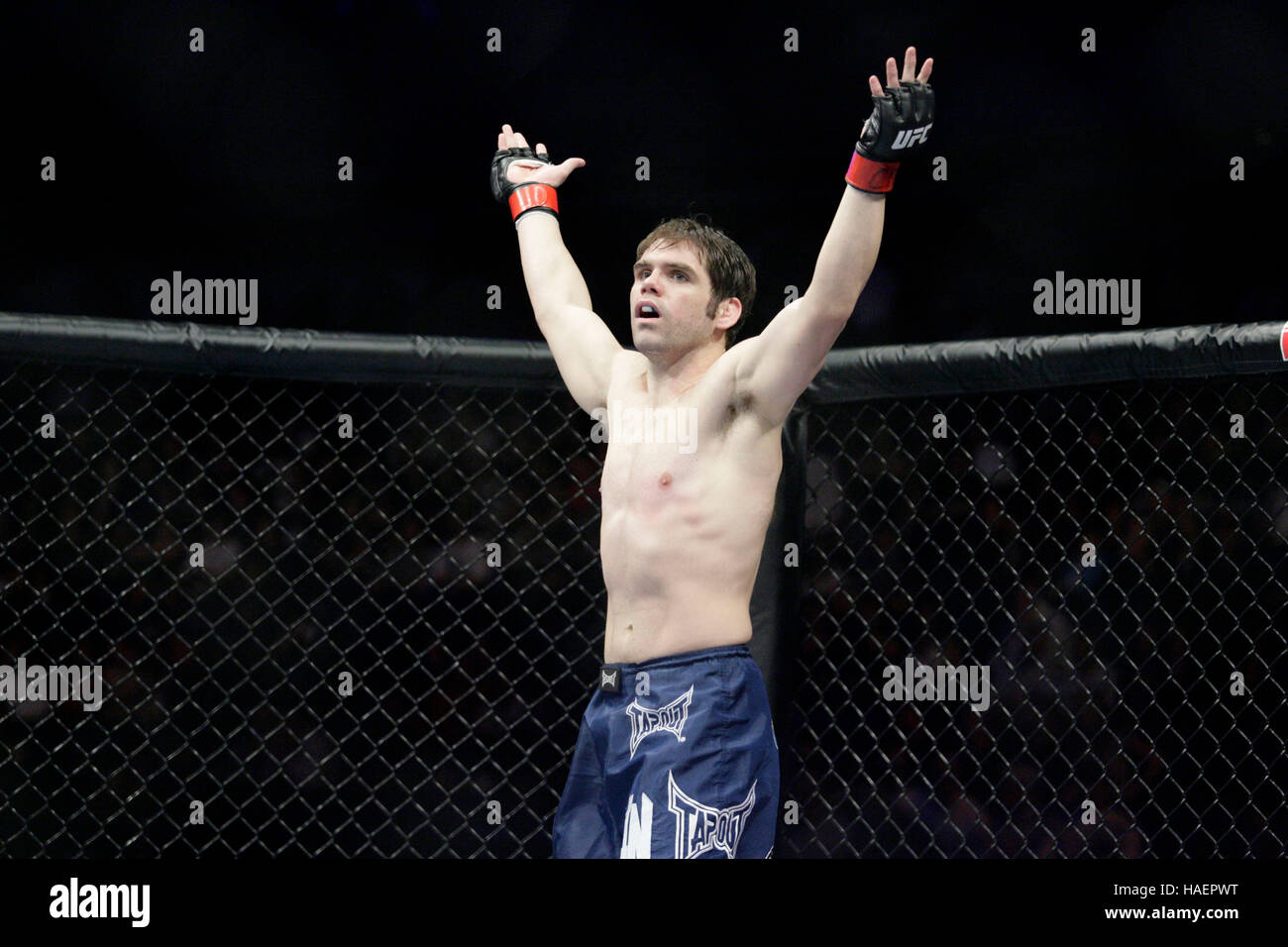 Aaron Riley throws his hands up after referee stopped fight against ...