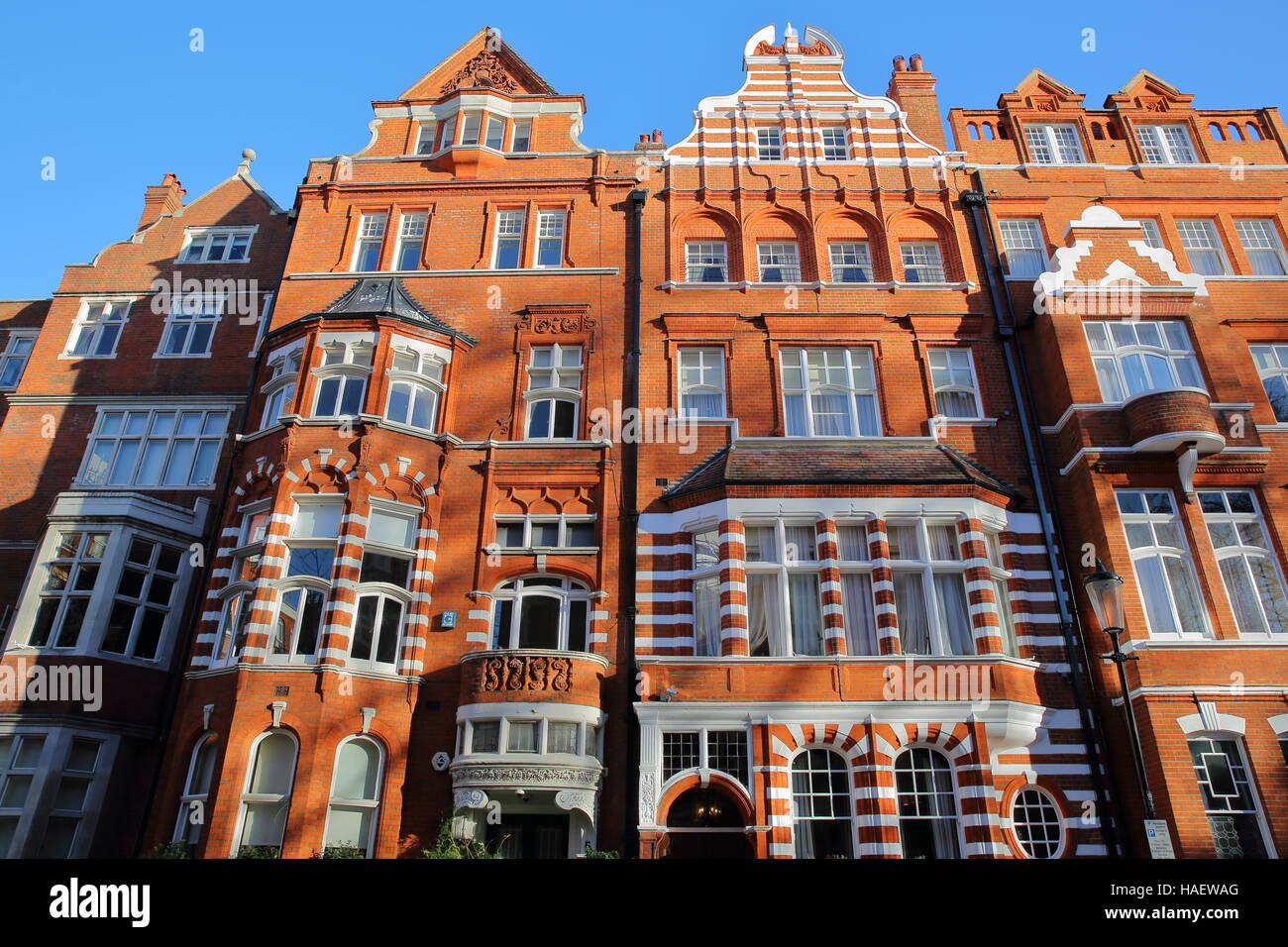 LONDON, UK: Red brick Victorian houses facades in the borough of ...
