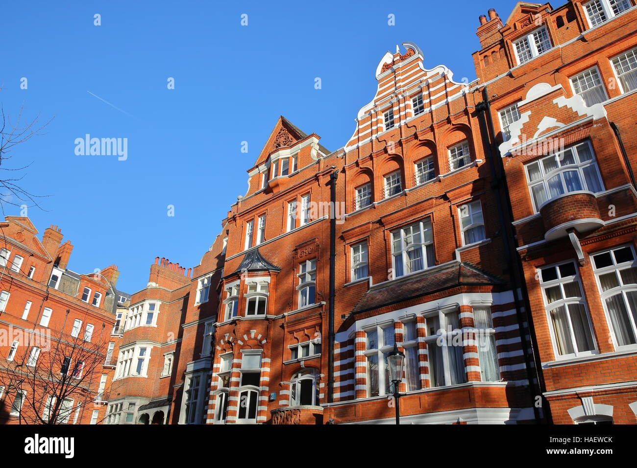 LONDON, UK: Red brick Victorian houses facades in the borough of ...