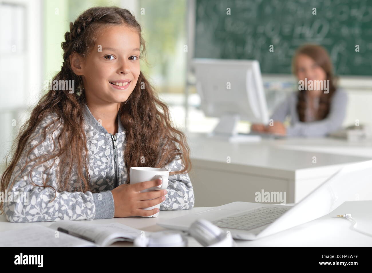 cute girl using laptop computer Stock Photo - Alamy