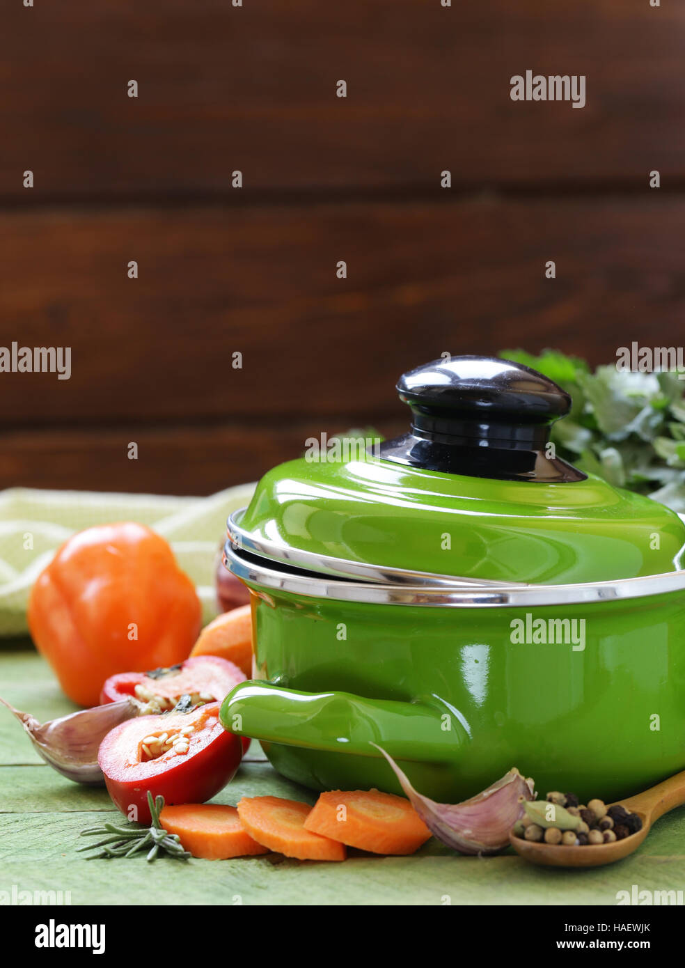 cooking pot and ingredients for soup or stew on rustic background Stock ...