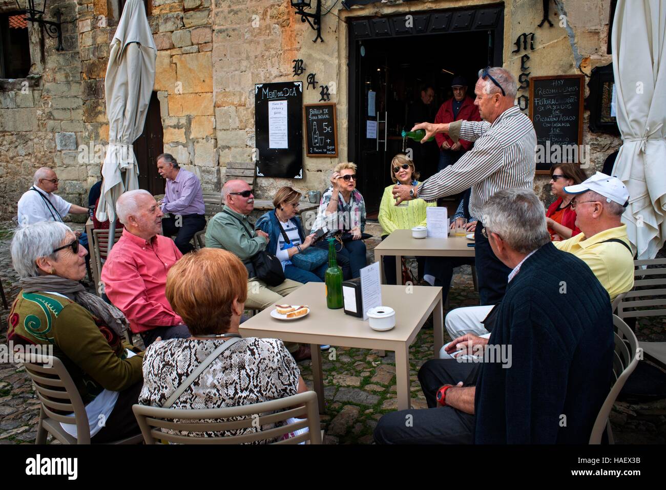 Sidra (cider) tasting in a bar in Santillana Del Mar, Medieval Village ...