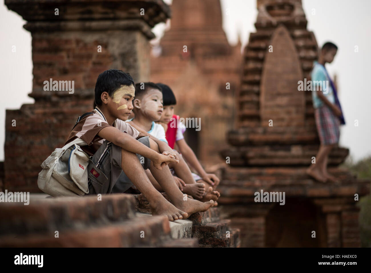 A group of kids at the Taung Guni temple in Bagan, Myanmar Stock Photo ...