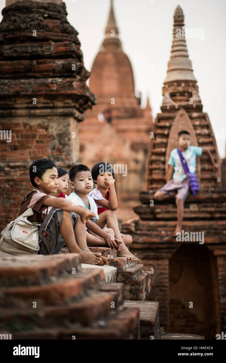 A group of kids at the Taung Guni temple in Bagan, Myanmar Stock Photo ...