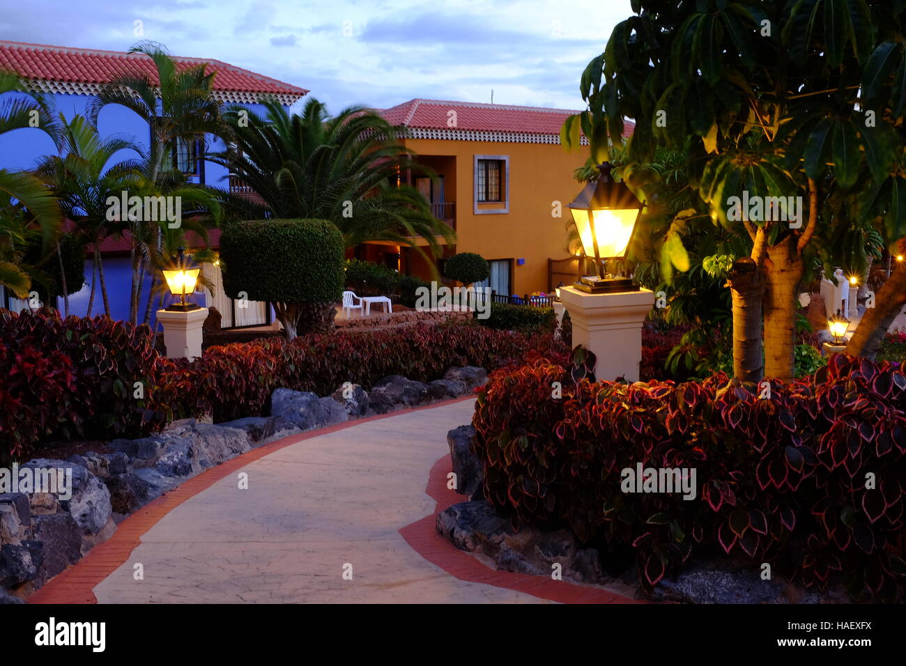 A tropical hotel resort at night Stock Photo - Alamy