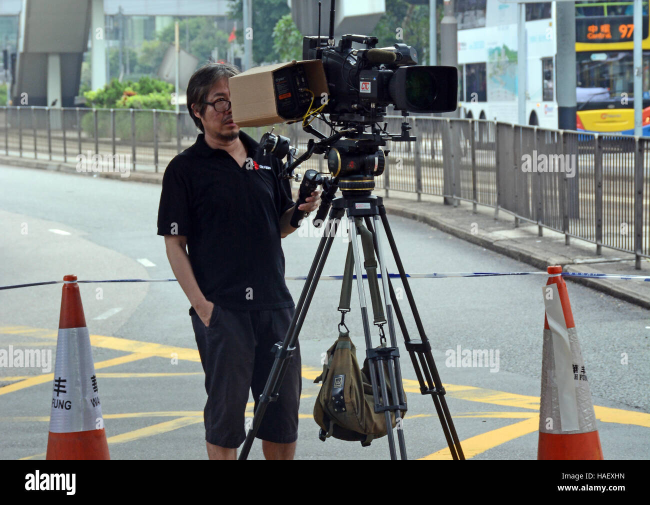 cameraman Hong Kong island China Stock Photo - Alamy