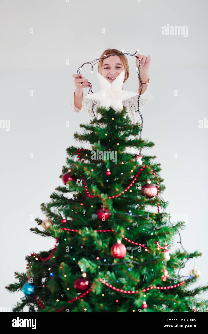 Tree with girl hi-res stock photography and images - Alamy