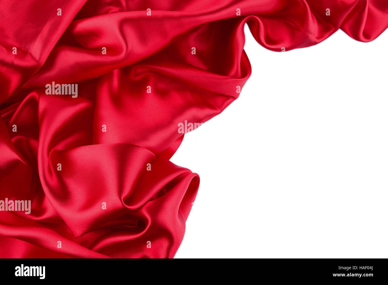 Closeup of folds in red silk fabric on plain background Stock Photo - Alamy