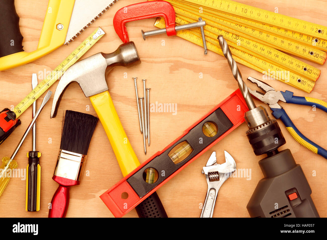 Assorted work tools on wood Stock Photo - Alamy