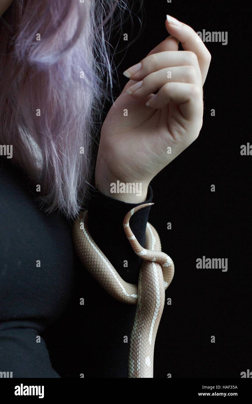 Girl with snake hi-res stock photography and images - Alamy