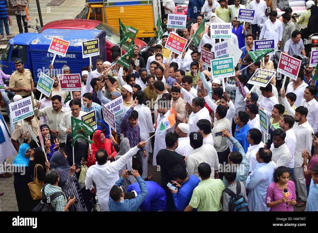 All India Majlis-e-Ittehadul Muslimeen (AIMIM) workers take a part in ...