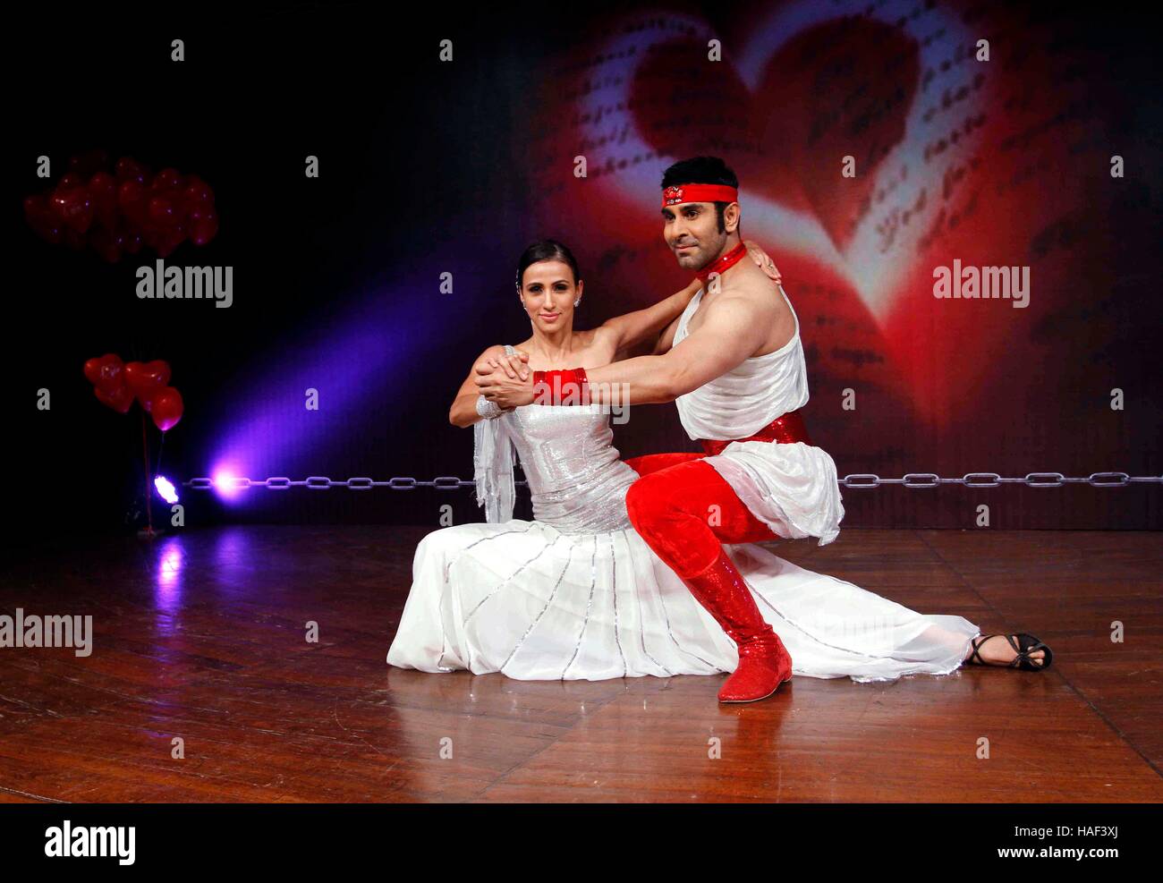 Bollywood choreographer Sandip Soparrkar and model Alesia Raut poses ...