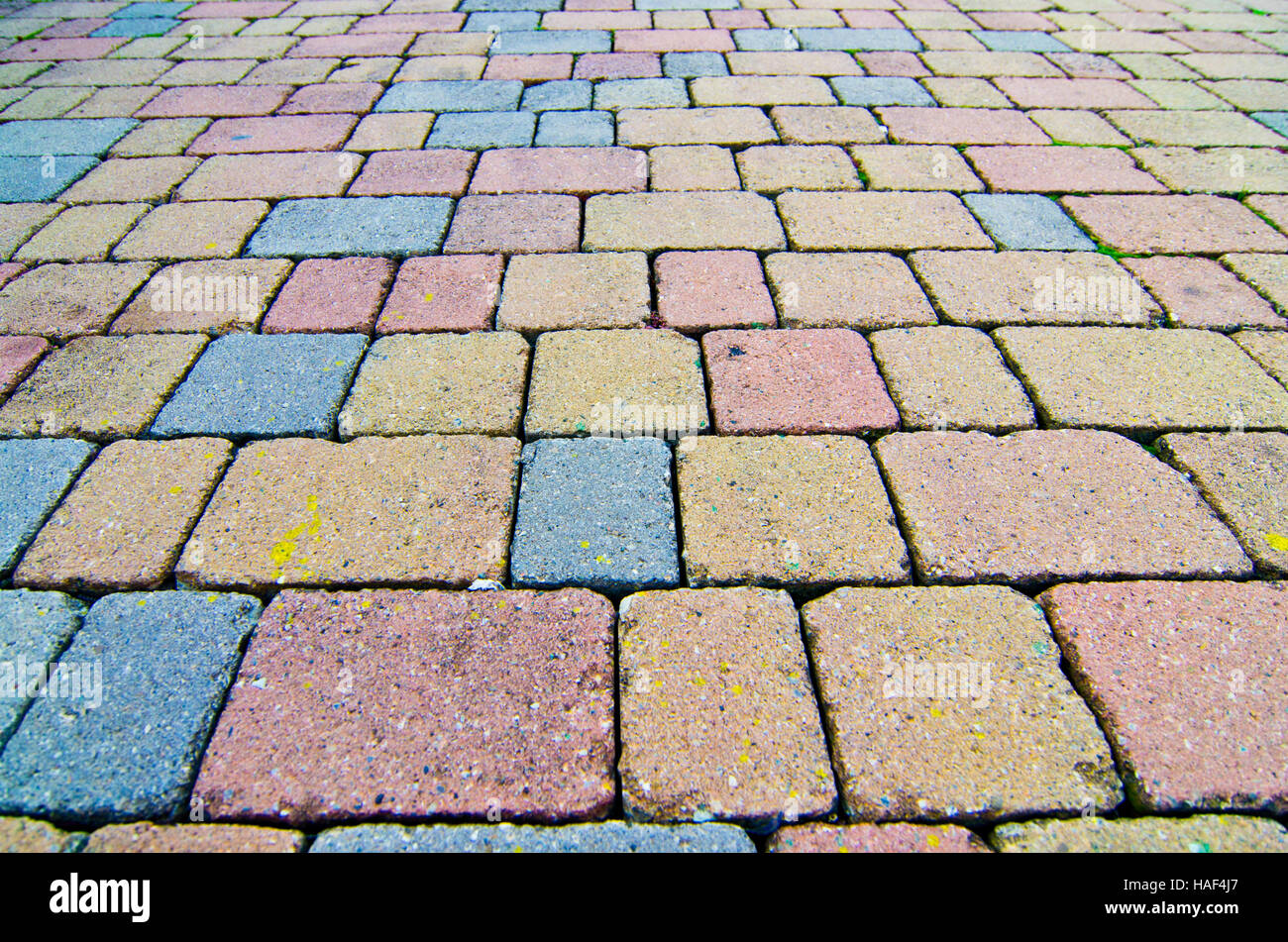 paving stone bricks of different colors and of irregular composition ...