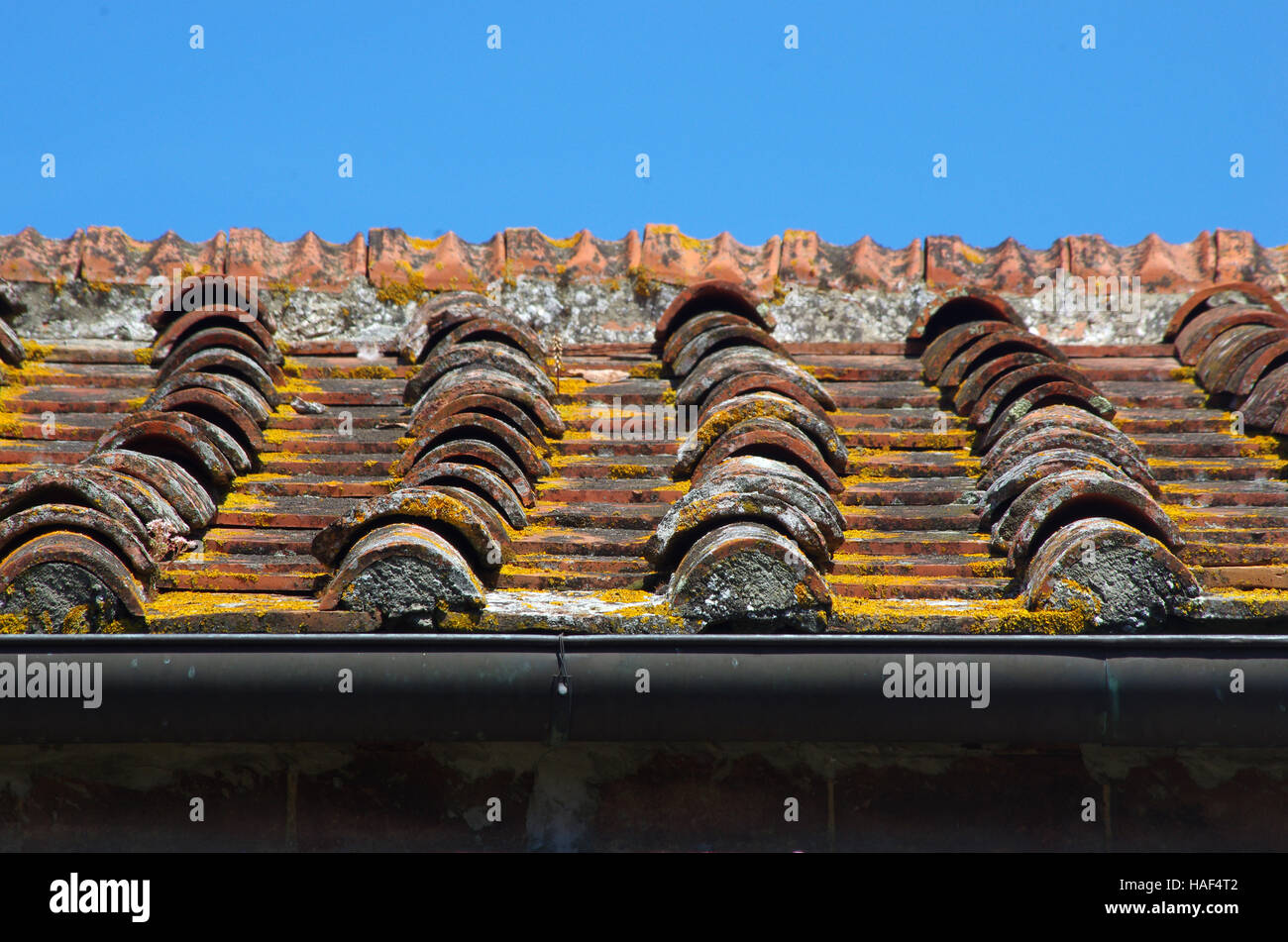 traditional roof tile with tiles and cement and plaster of historic ...