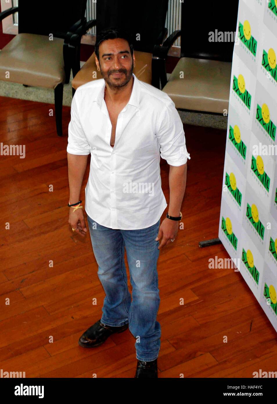Bollywood actor Ajay Devgn press conference Smile Foundation to ...