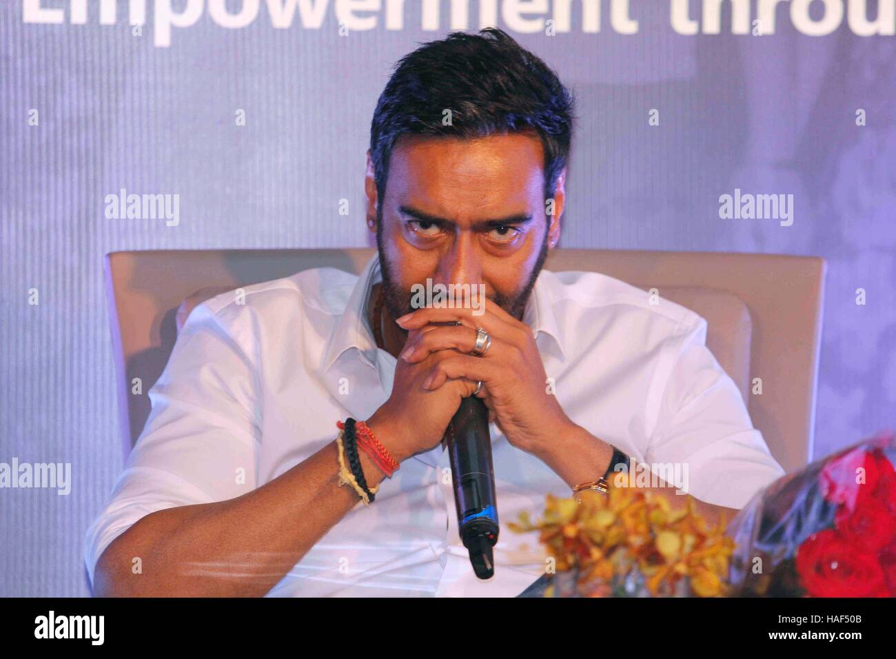Bollywood actor Ajay Devgn press conference of Smile Foundation to ...