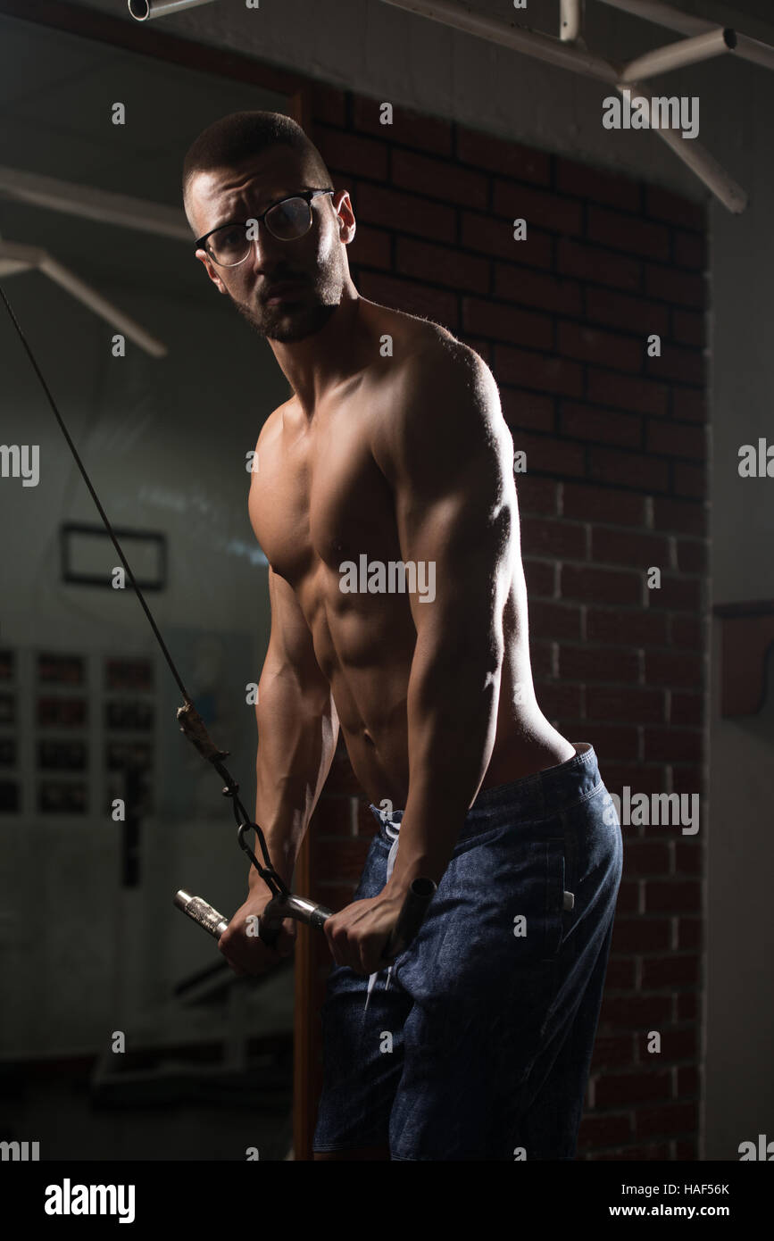 Nerd Muscular Fitness Bodybuilder Doing Heavy Weight Exercise For ...