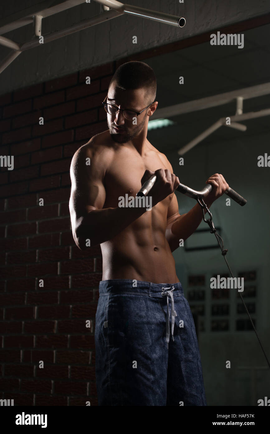 Nerd Muscular Fitness Bodybuilder Doing Heavy Weight Exercise For ...