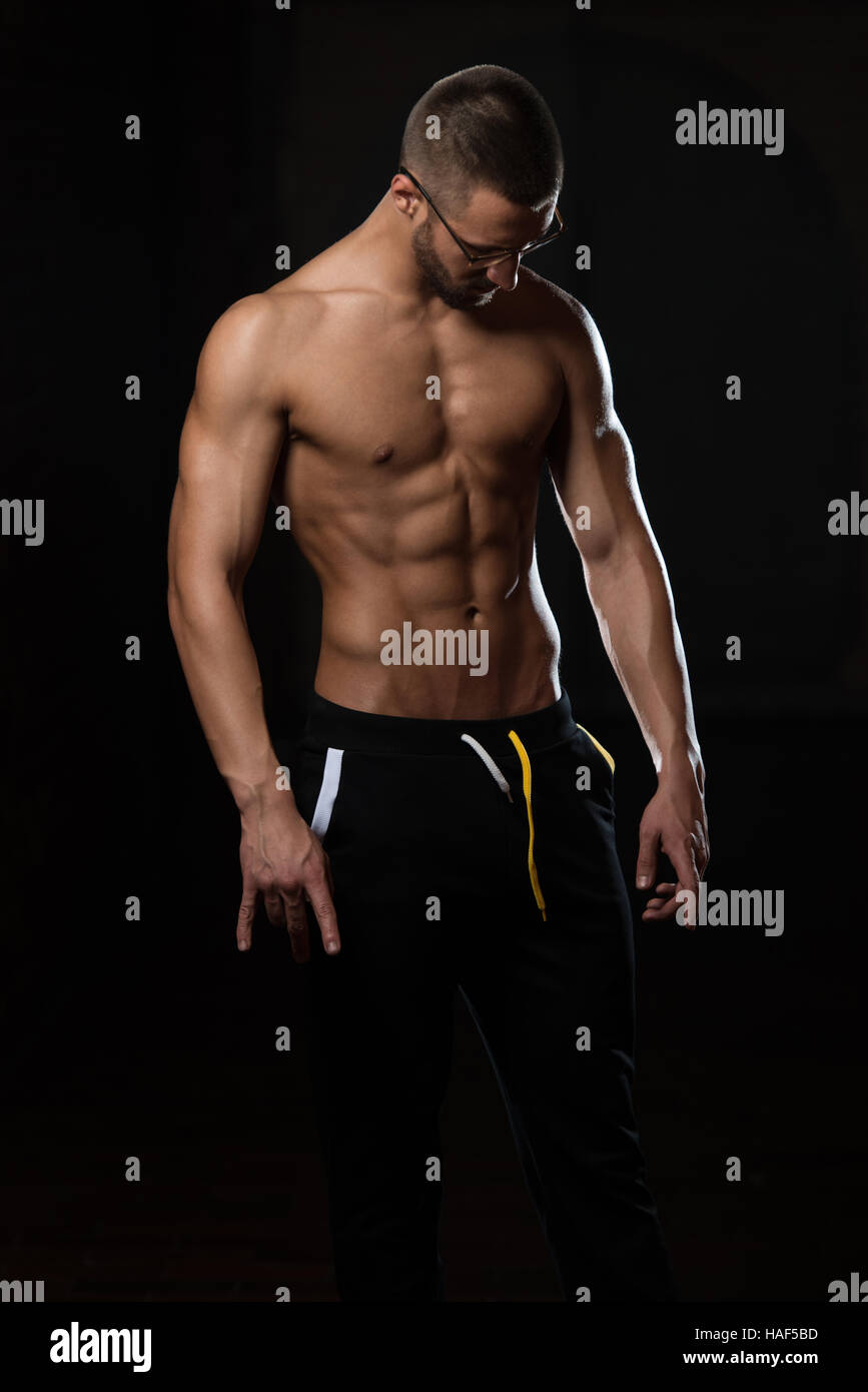 Geek flexing muscles hi-res stock photography and images - Alamy