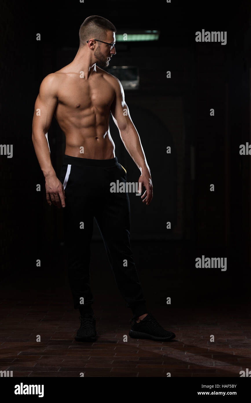 Geek flexing muscles hi-res stock photography and images - Alamy