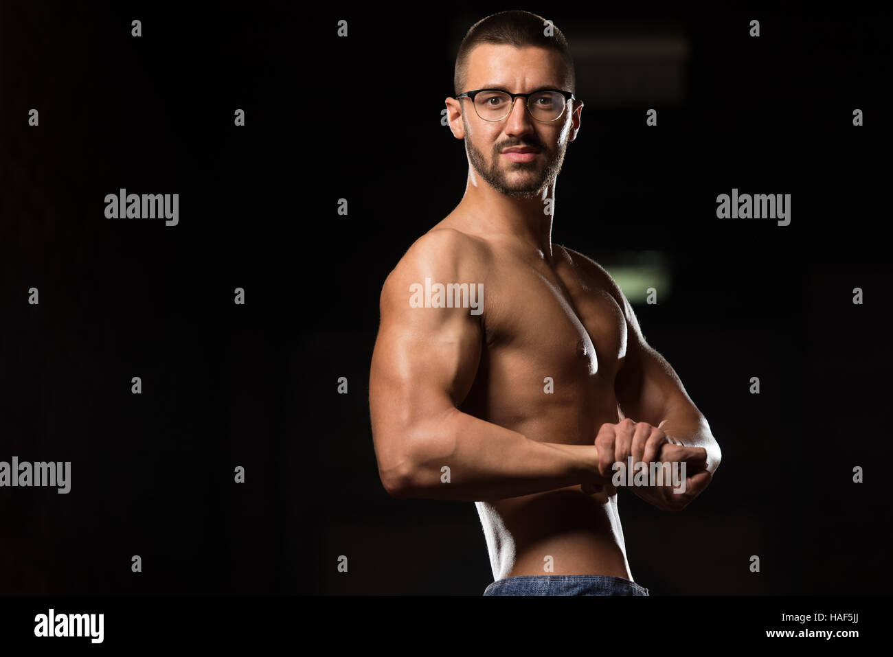 Geek flexing muscles hi-res stock photography and images - Alamy