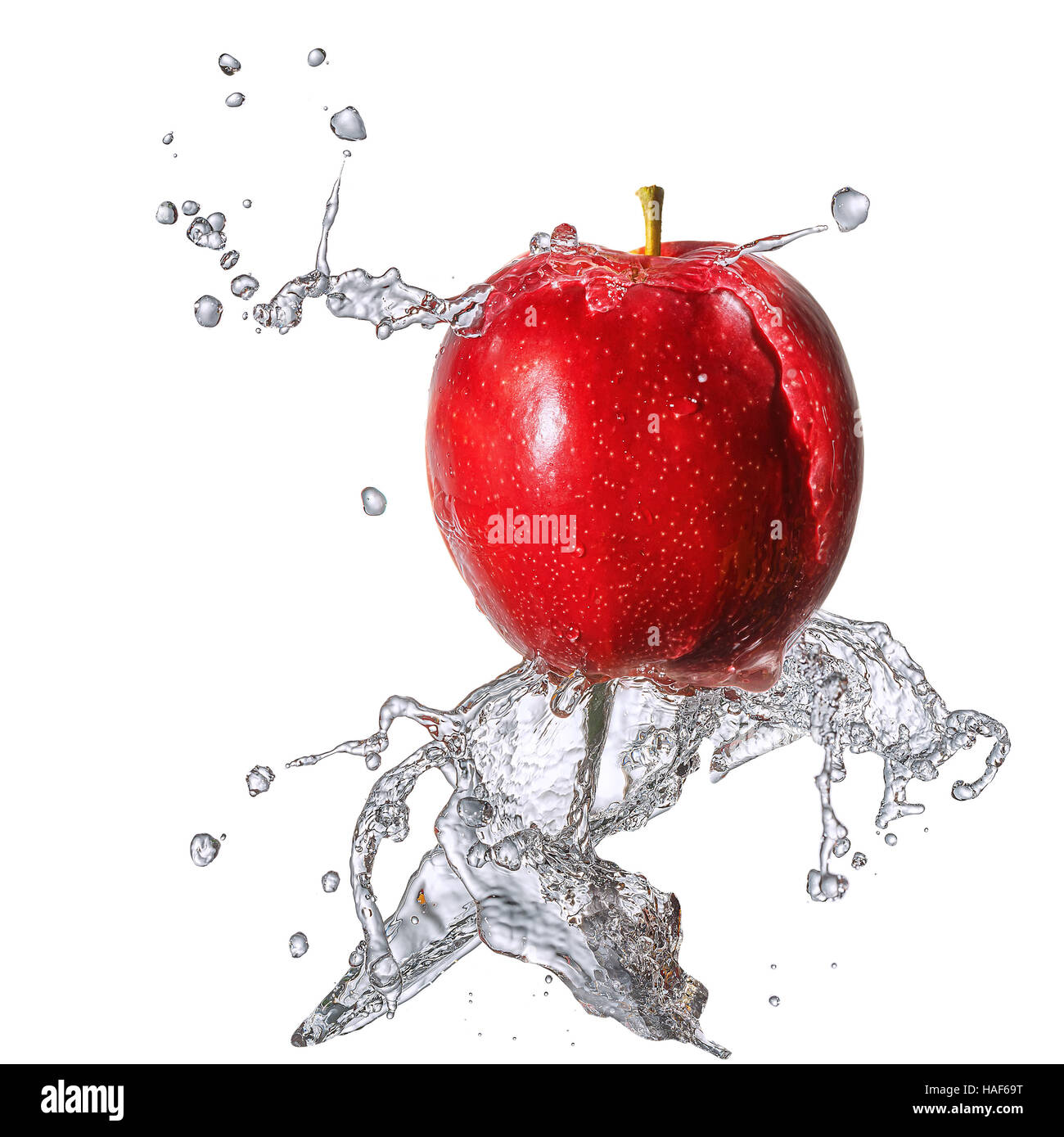 Water splash with apple isolated Stock Photo - Alamy