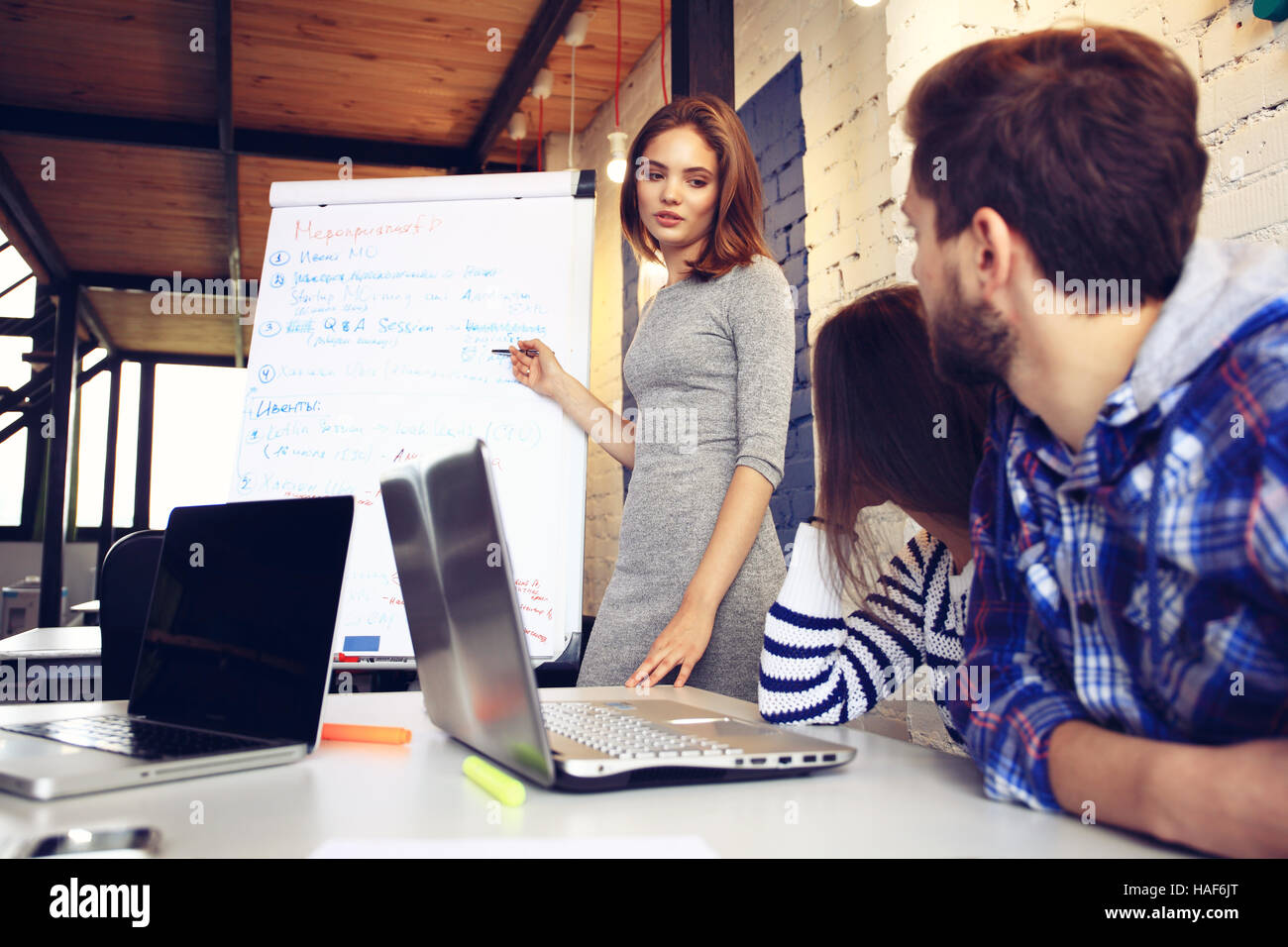 Woman making a business presentation Stock Photo - Alamy