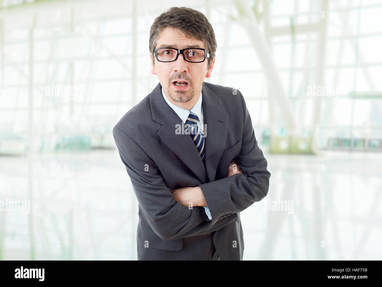 young business man surprised at the office Stock Photo - Alamy