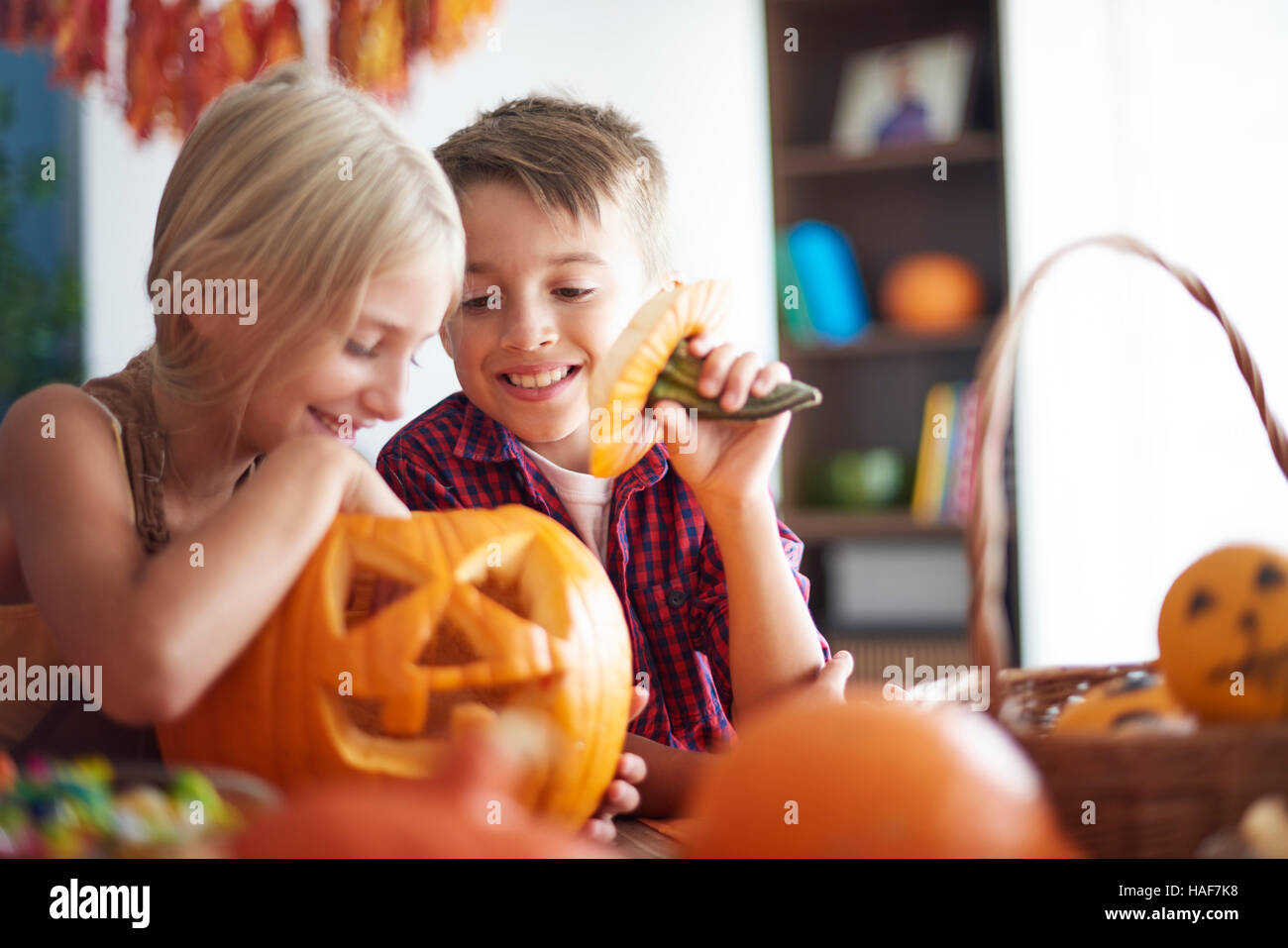 Children having fun with pumpkin Stock Photo - Alamy