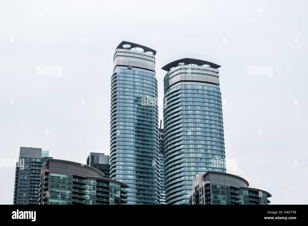 Facade of blue glass skyscraper in Toronto downtown at low angle Stock ...