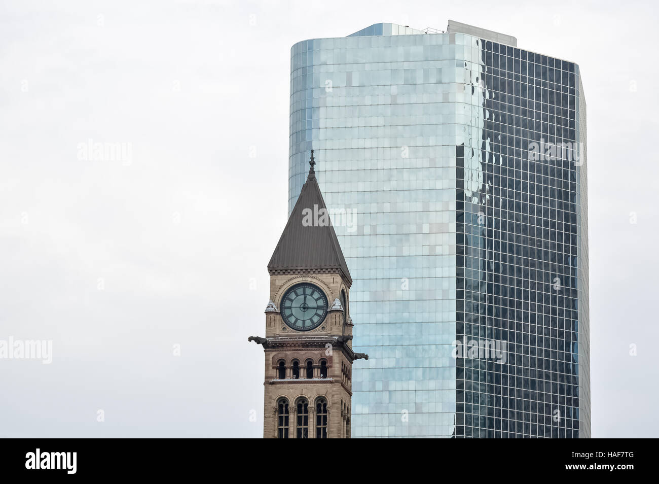 Old city hall clock tower and skyscraper in Toronto downtown Stock ...