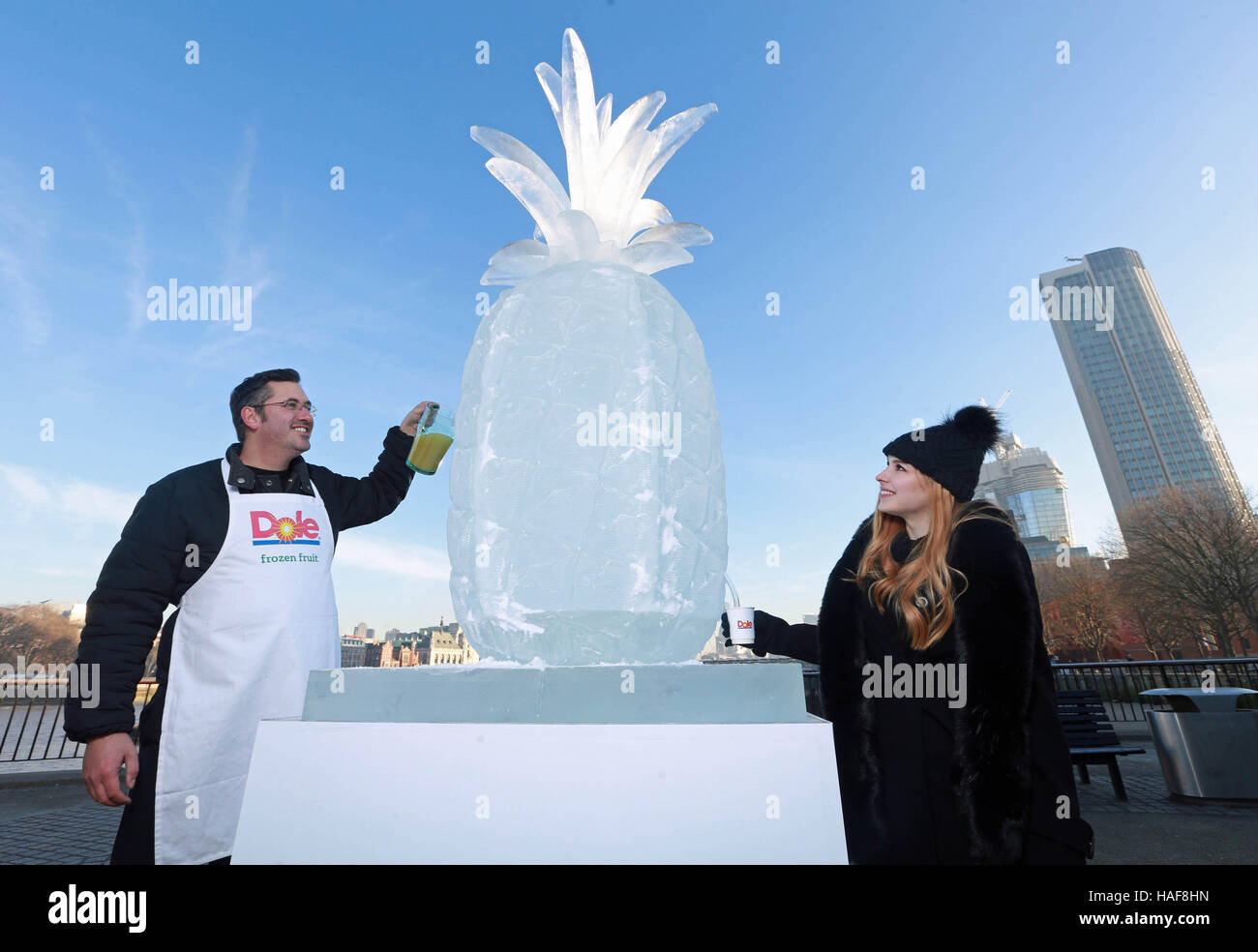 EDITORIAL USE ONLY Natasha Killip picks up a free smoothie made from ...