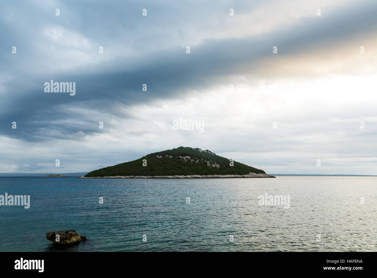 The soft morning light illuminates the sea around Veli Osir and Mali ...
