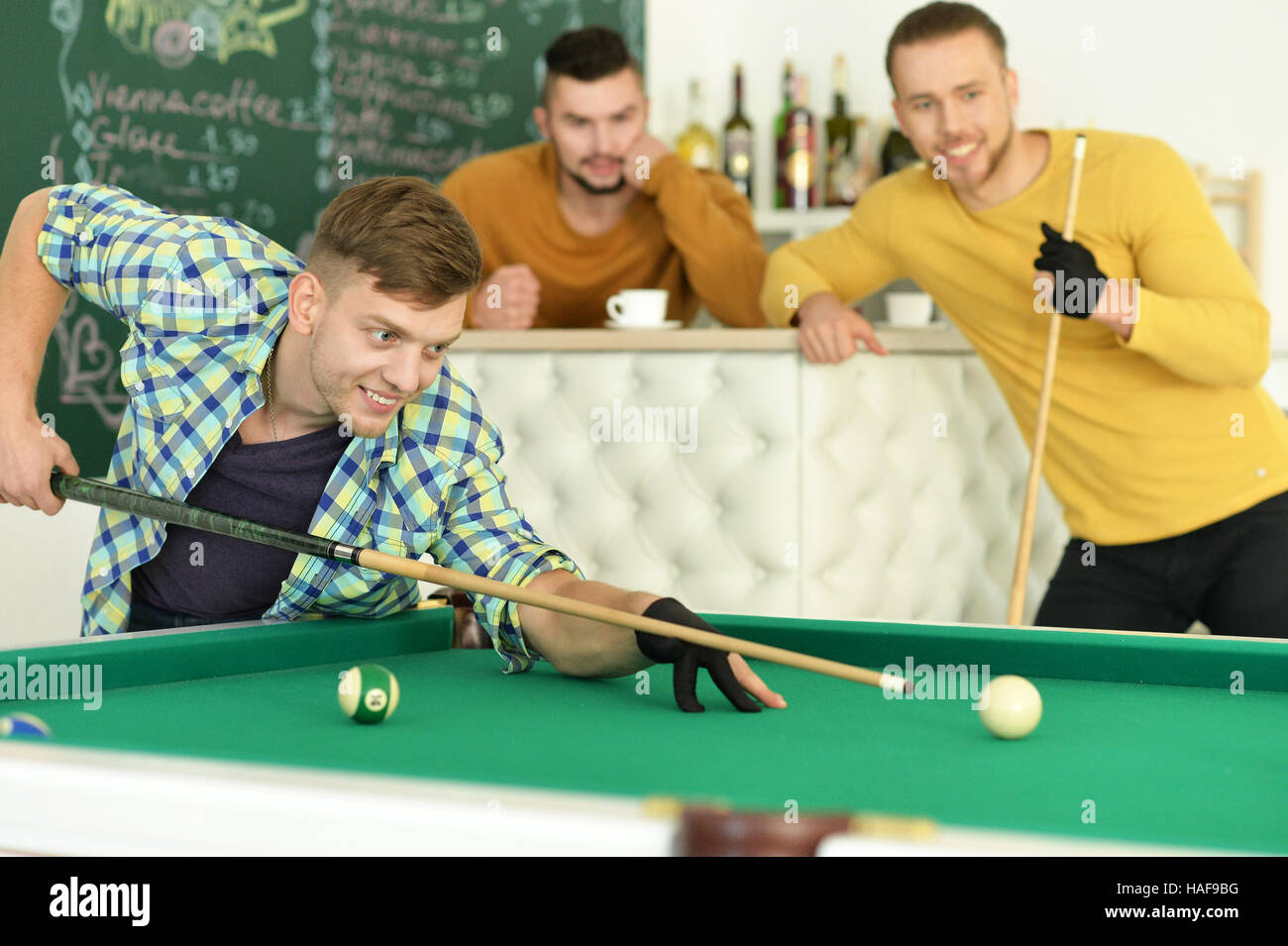 Men play billiard Stock Photo - Alamy