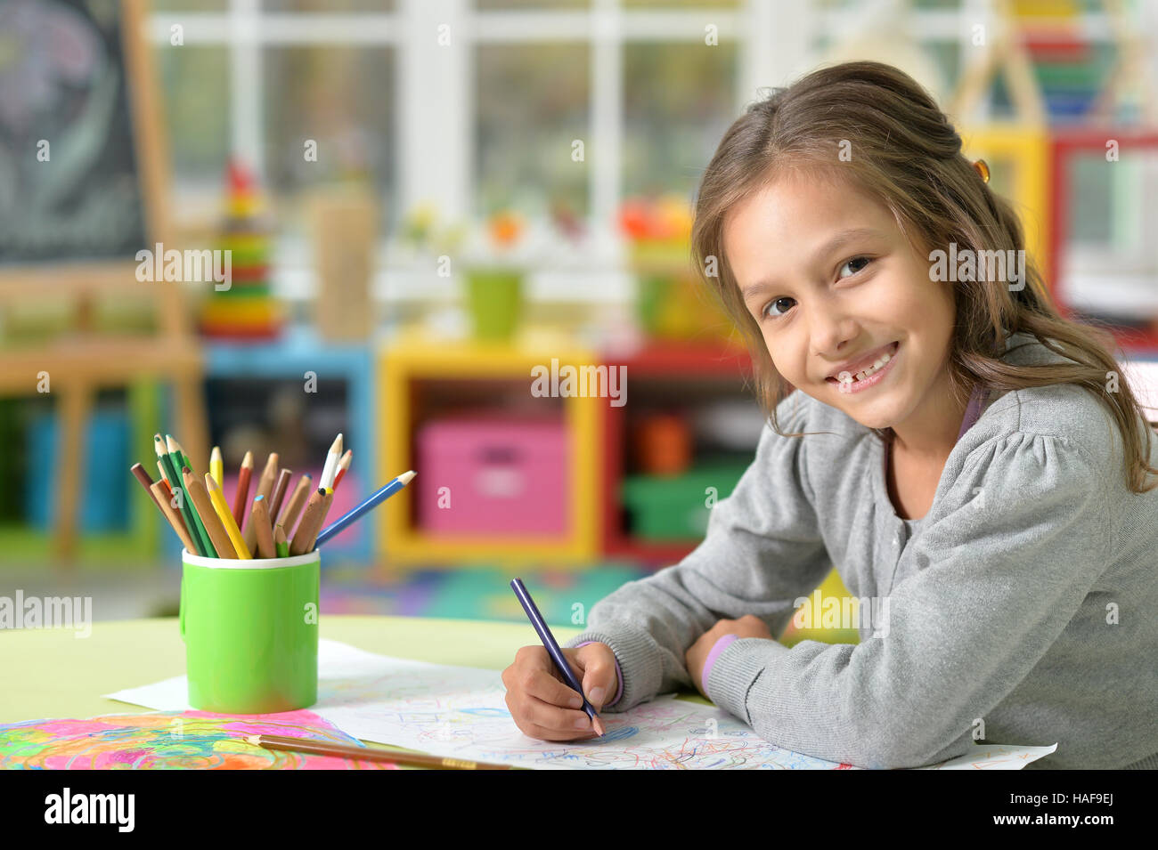 Little girl drawing Stock Photo - Alamy
