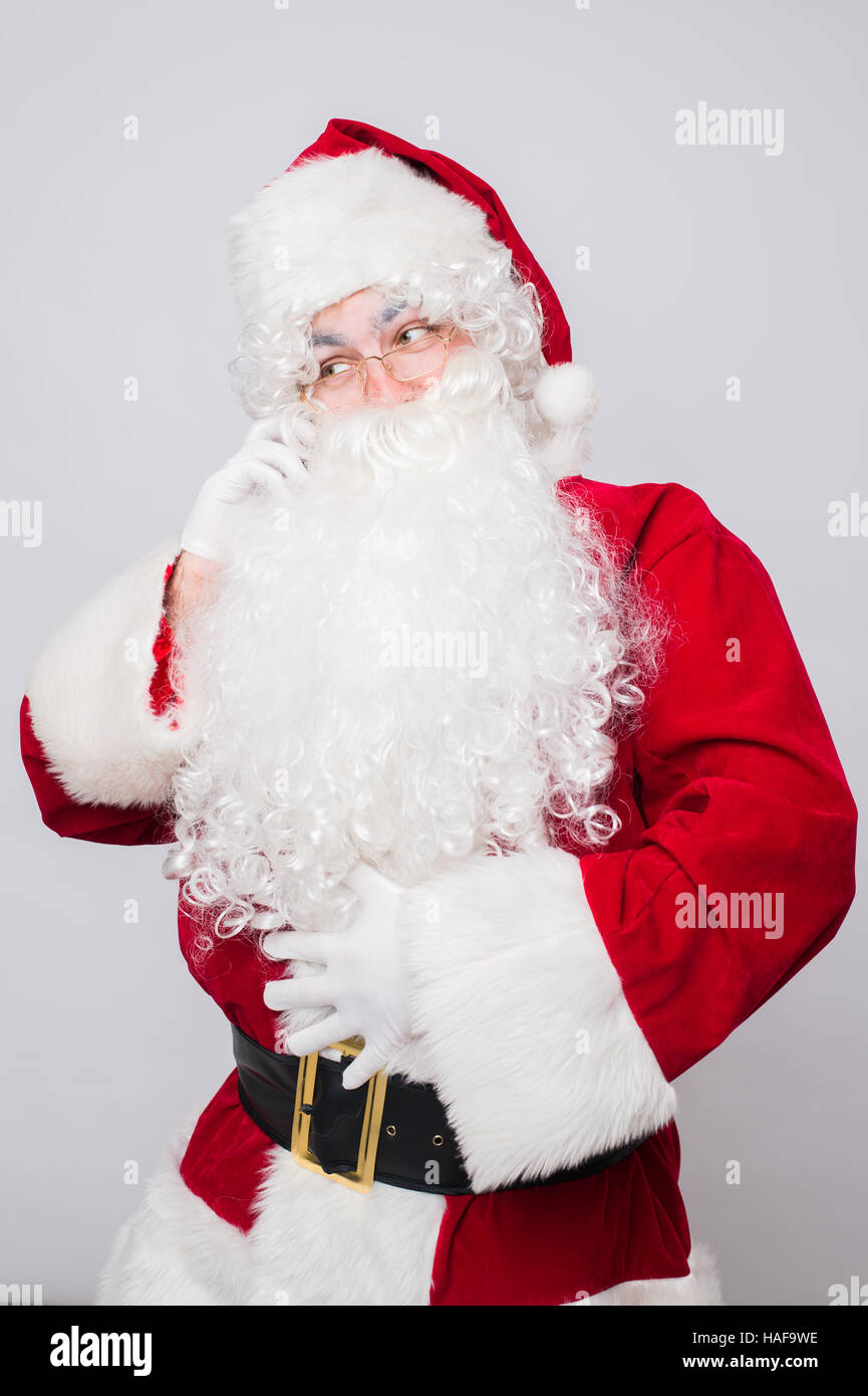 Santa Claus on christmas calling by phone. Isolated Stock Photo - Alamy