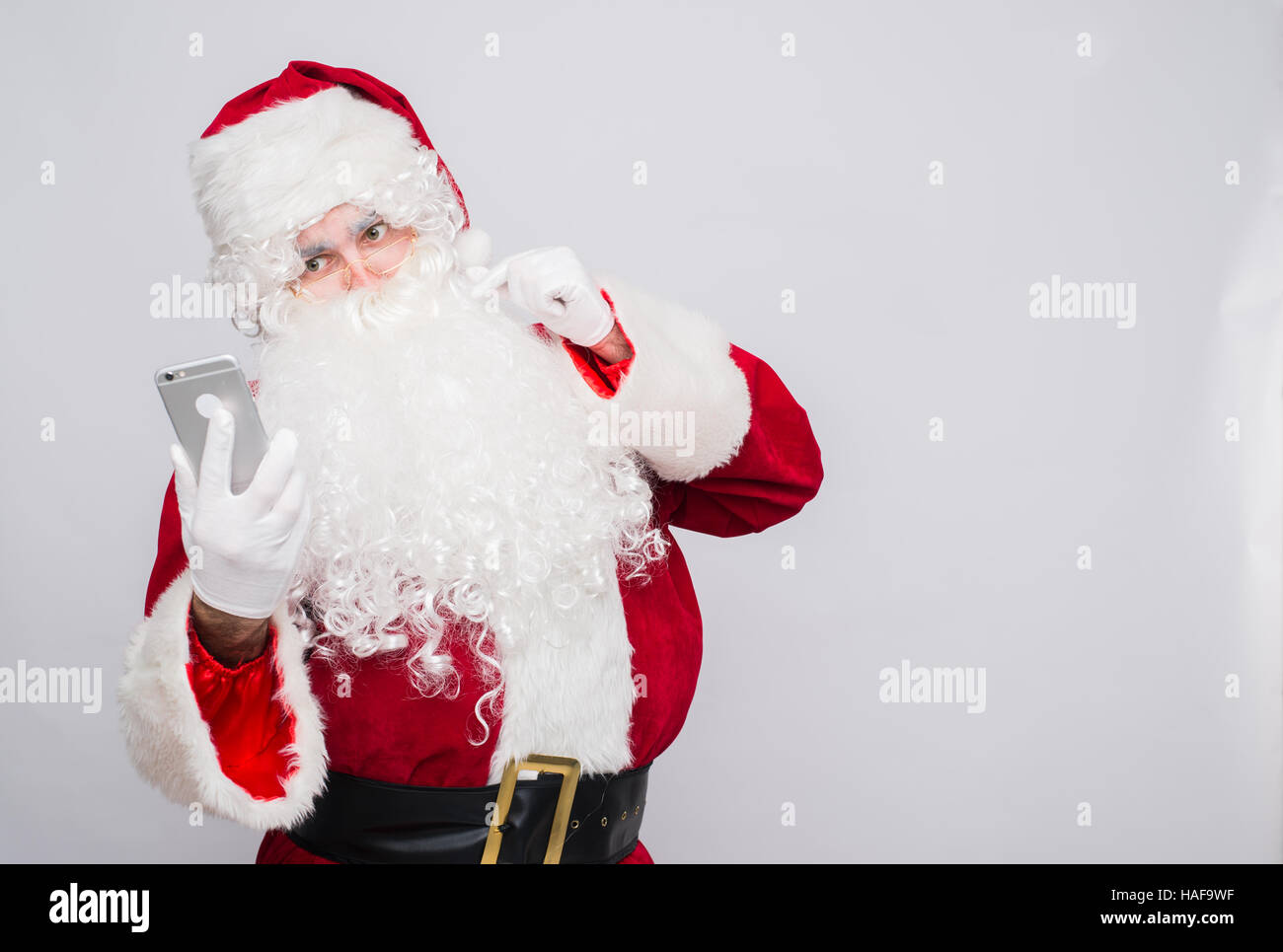 Santa Claus makes a selfie on white background Stock Photo - Alamy