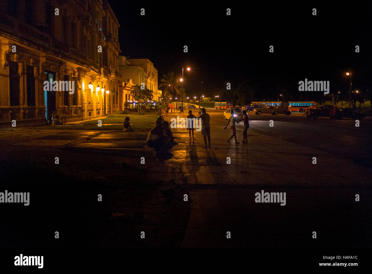 Night street scene Havana Cuba, children playing in the shadows Stock ...