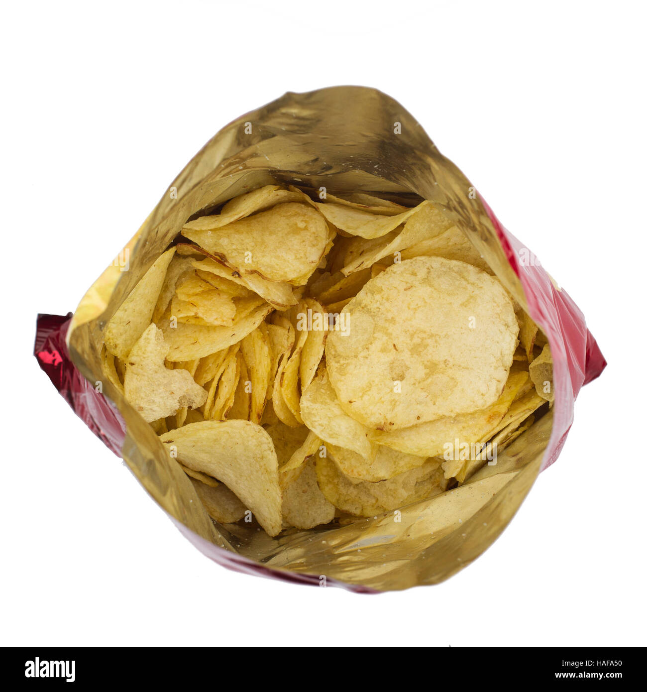 top view of red open round potato snacks open bag packaging isolated on ...