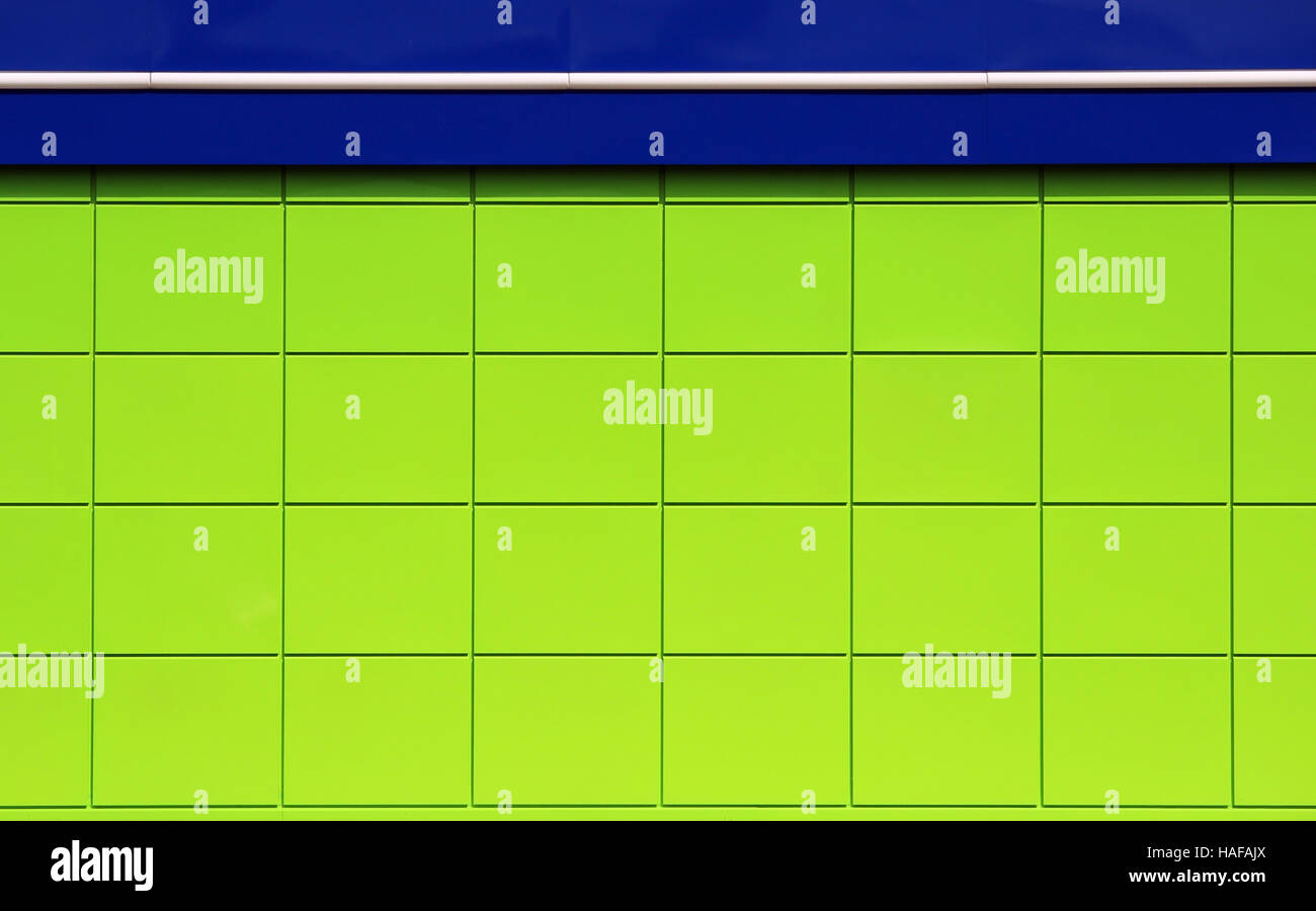 texture of bright green building with a blue roof utility room near the ...