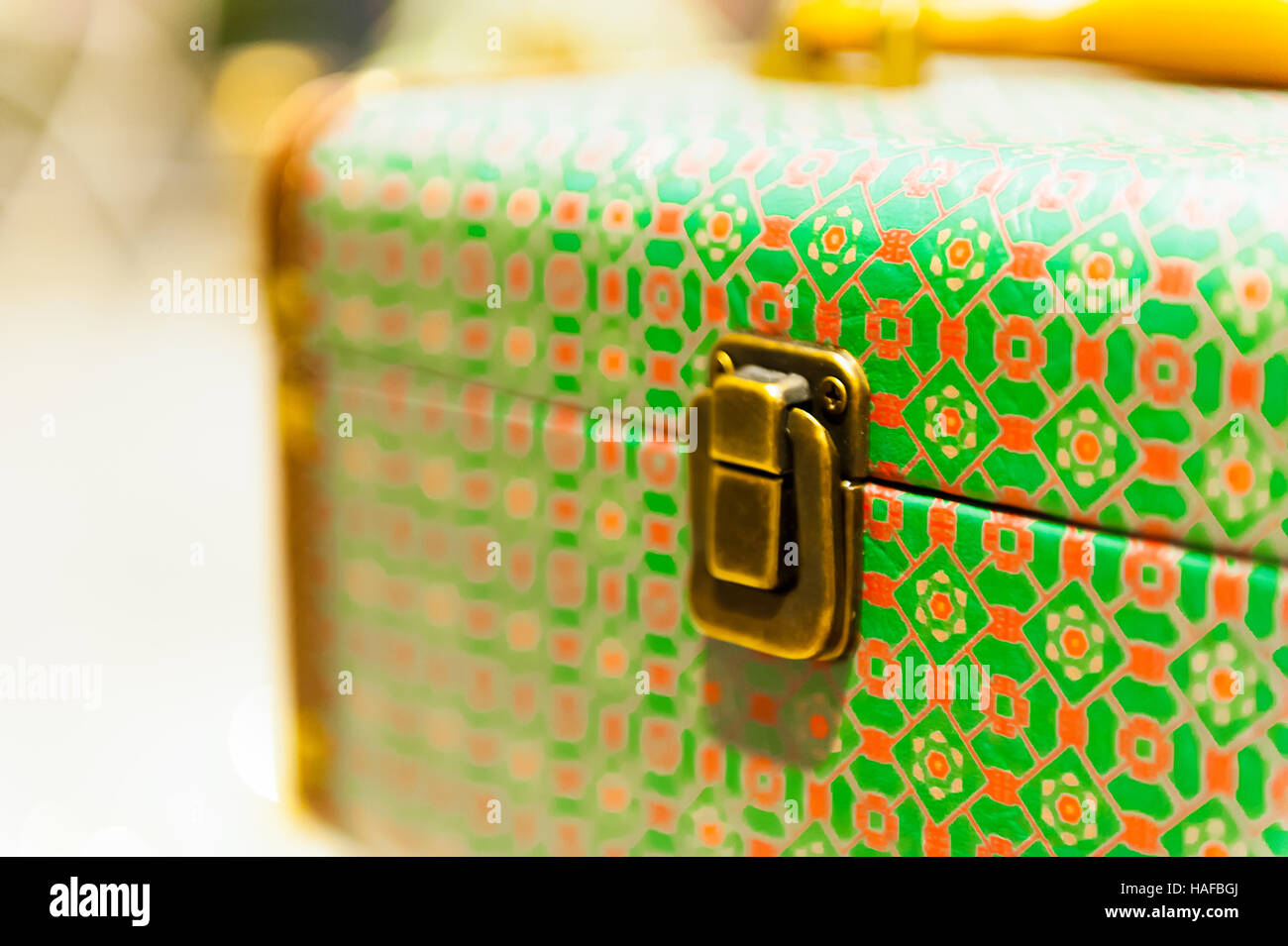 old suitcase lock with a pattern closeup shot shallow depth of field ...