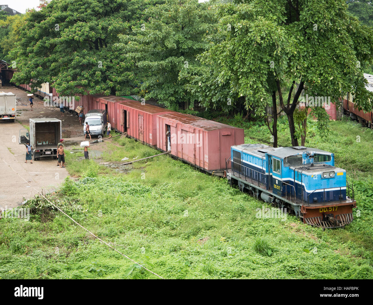 Freight train being loaded at Yangon Central Railway Station, Myanmar ...